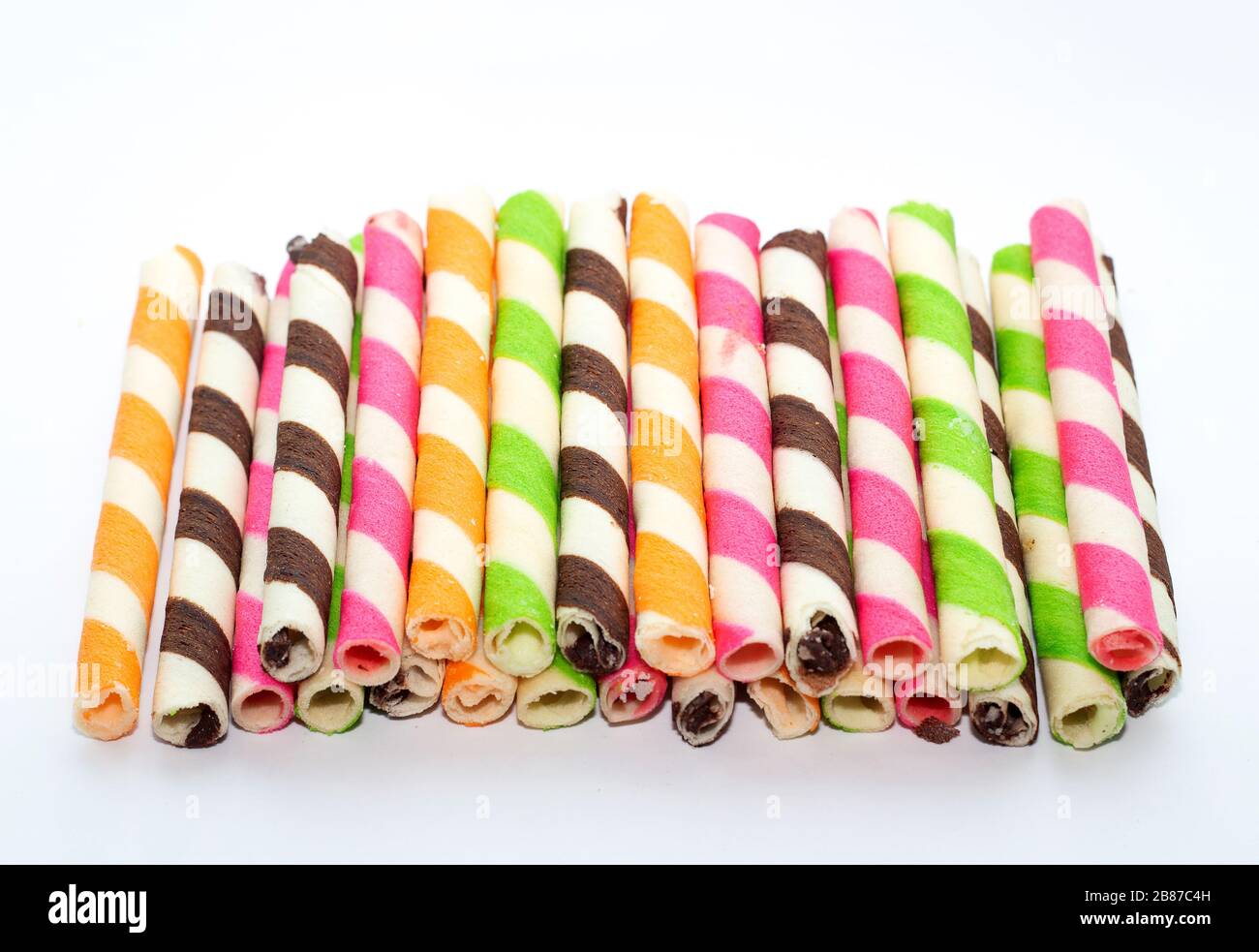crispy rainbow snack roll with mix flavour on white background Stock ...