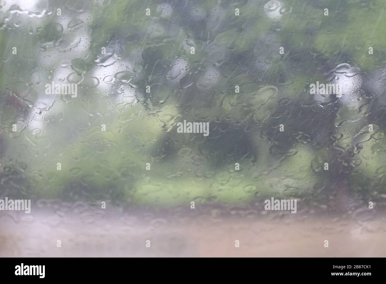 Rainy season, Splash Rain droplets Natural Water Drops on Glass Window ...