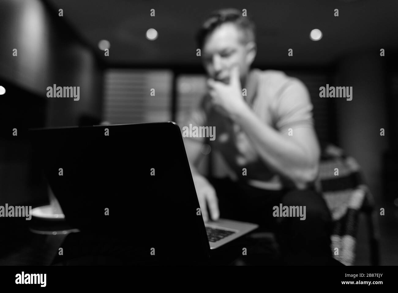 Man thinking laptop in Black and White Stock Photos & Images - Alamy