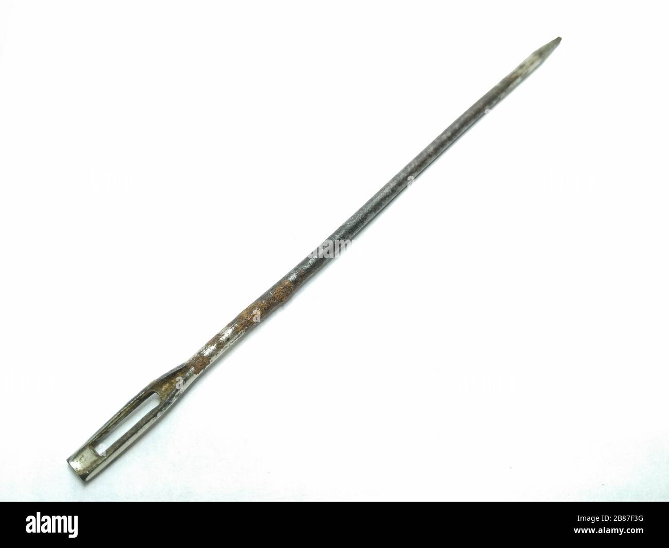 A picture of big needles isolated on white background Stock Photo - Alamy