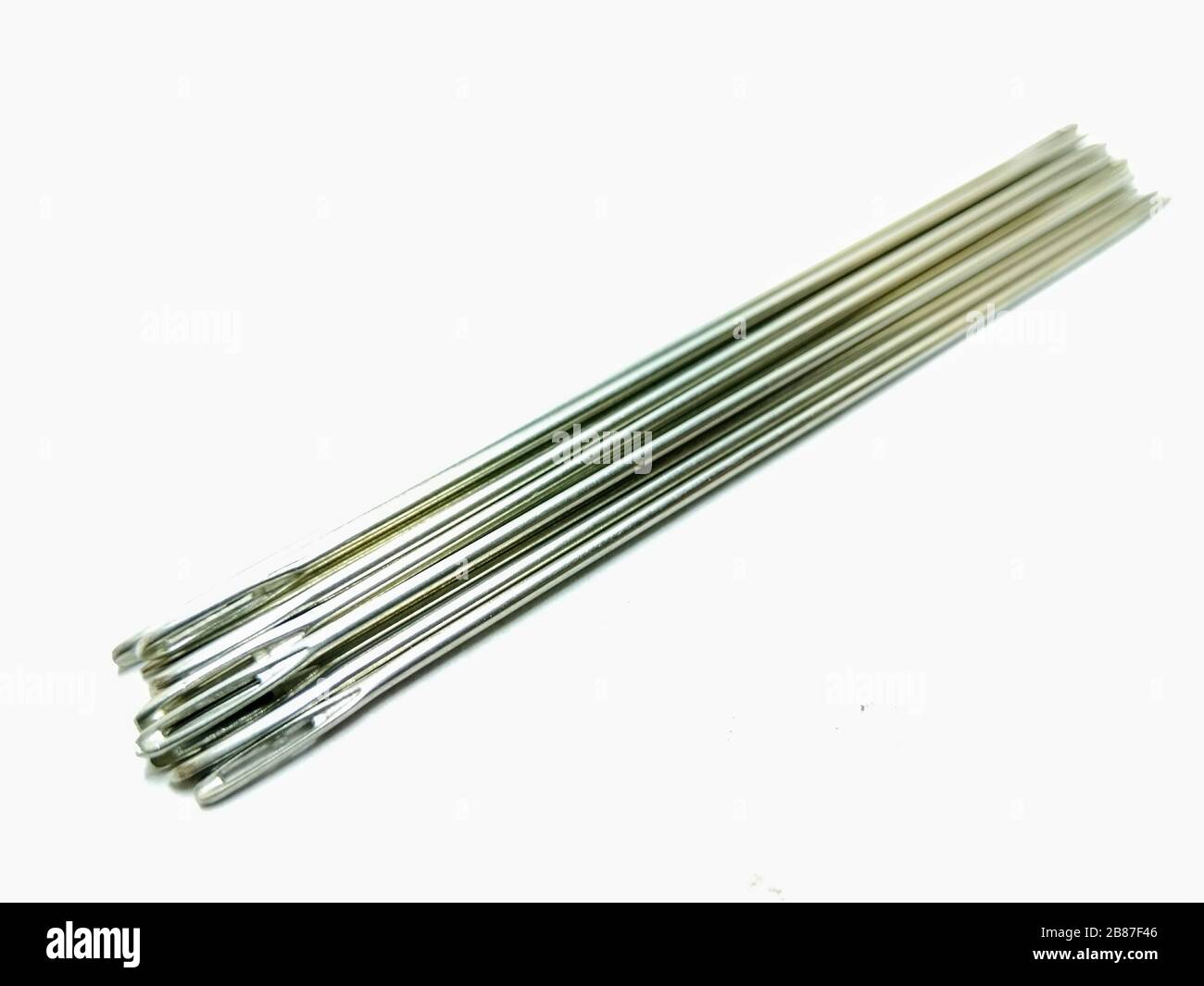 A picture of big needles isolated on white background Stock Photo - Alamy