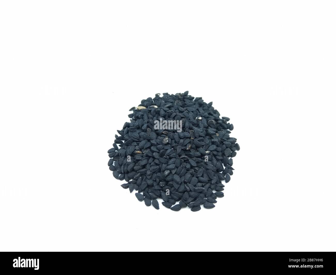 Heap black nigella seeds Cut Out Stock Images & Pictures - Alamy
