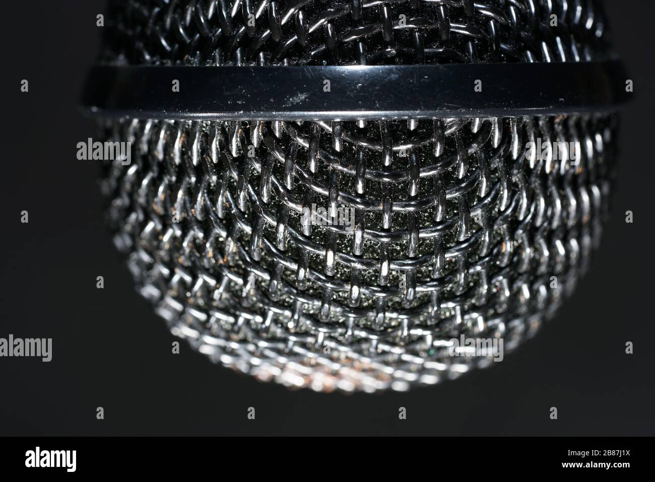 Microphones with wire mesh network photographed in the studio with ...