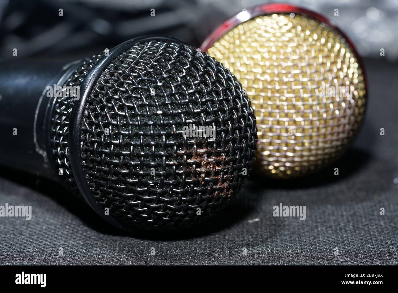Microphones with wire mesh network photographed in the studio with ...