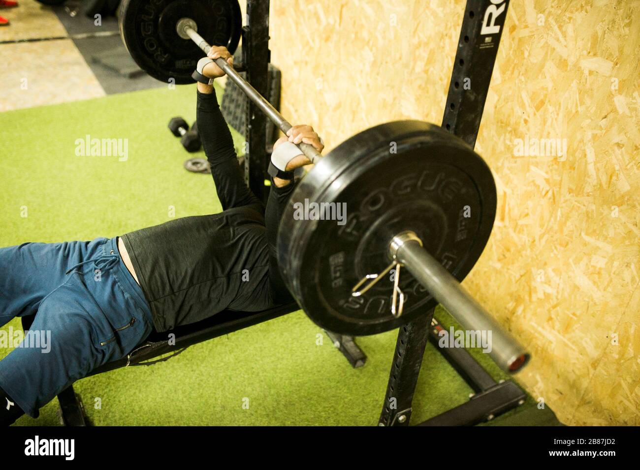 Bodybuilder with heavy barbbells in gym Stock Photo - Alamy