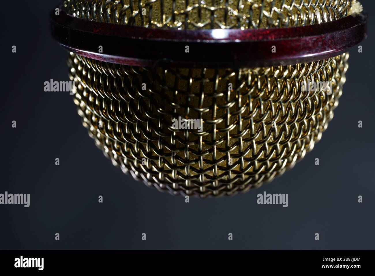 Microphones with wire mesh network photographed in the studio with ...