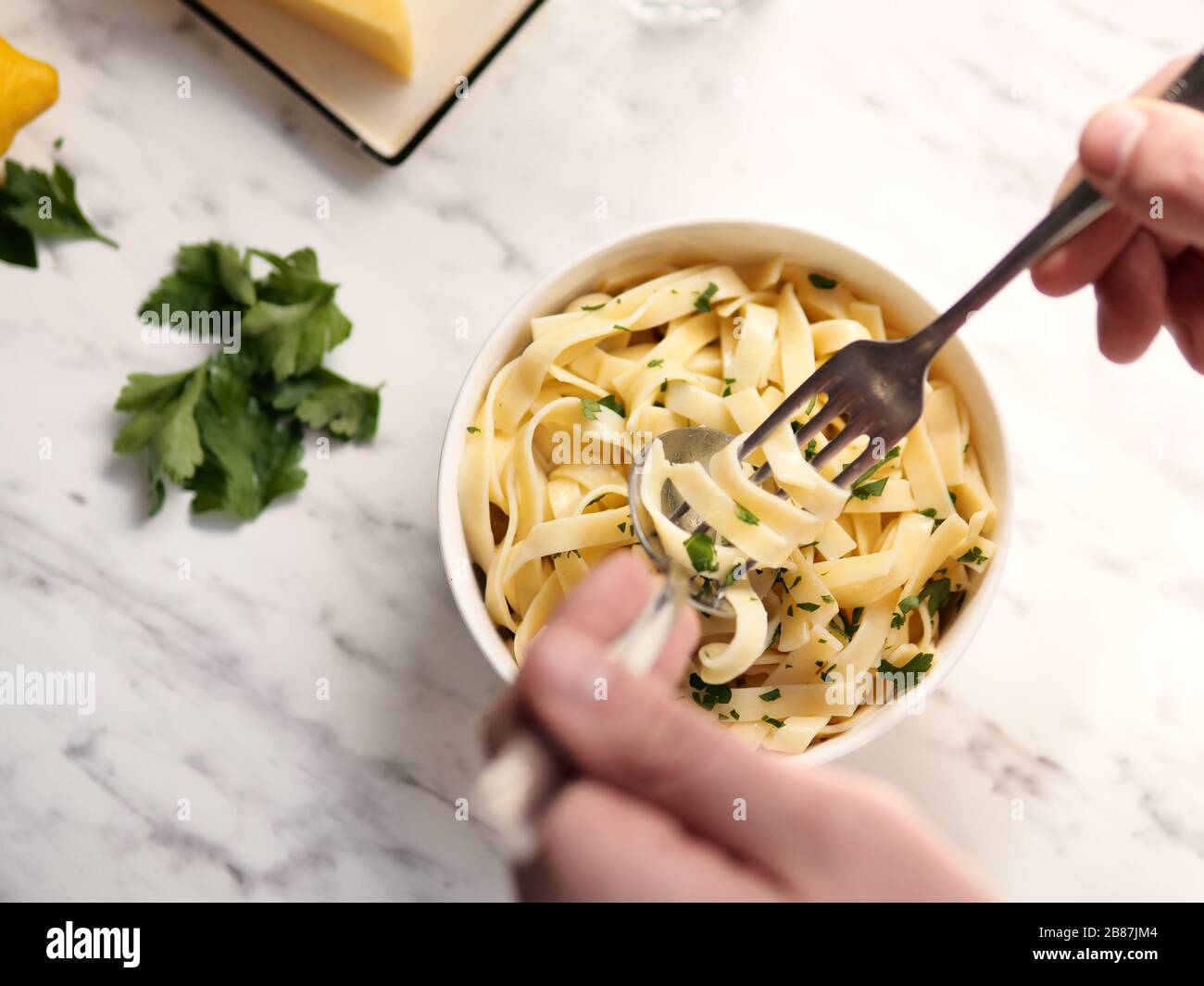 Close up man eating pasta hi-res stock photography and images - Alamy
