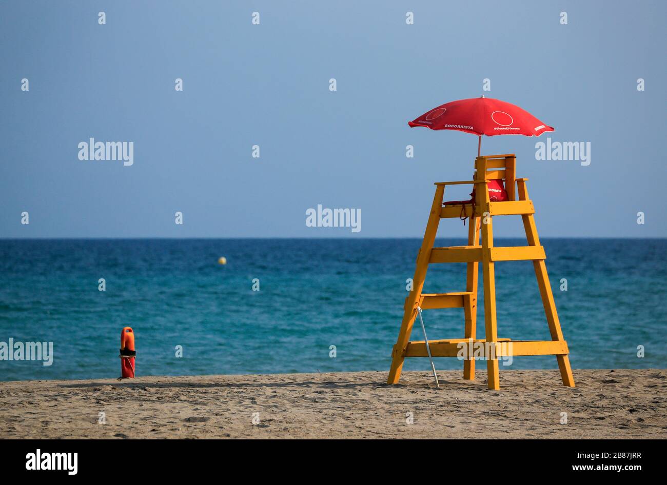 Lifeguard chair on empty beach Stock Photo - Alamy