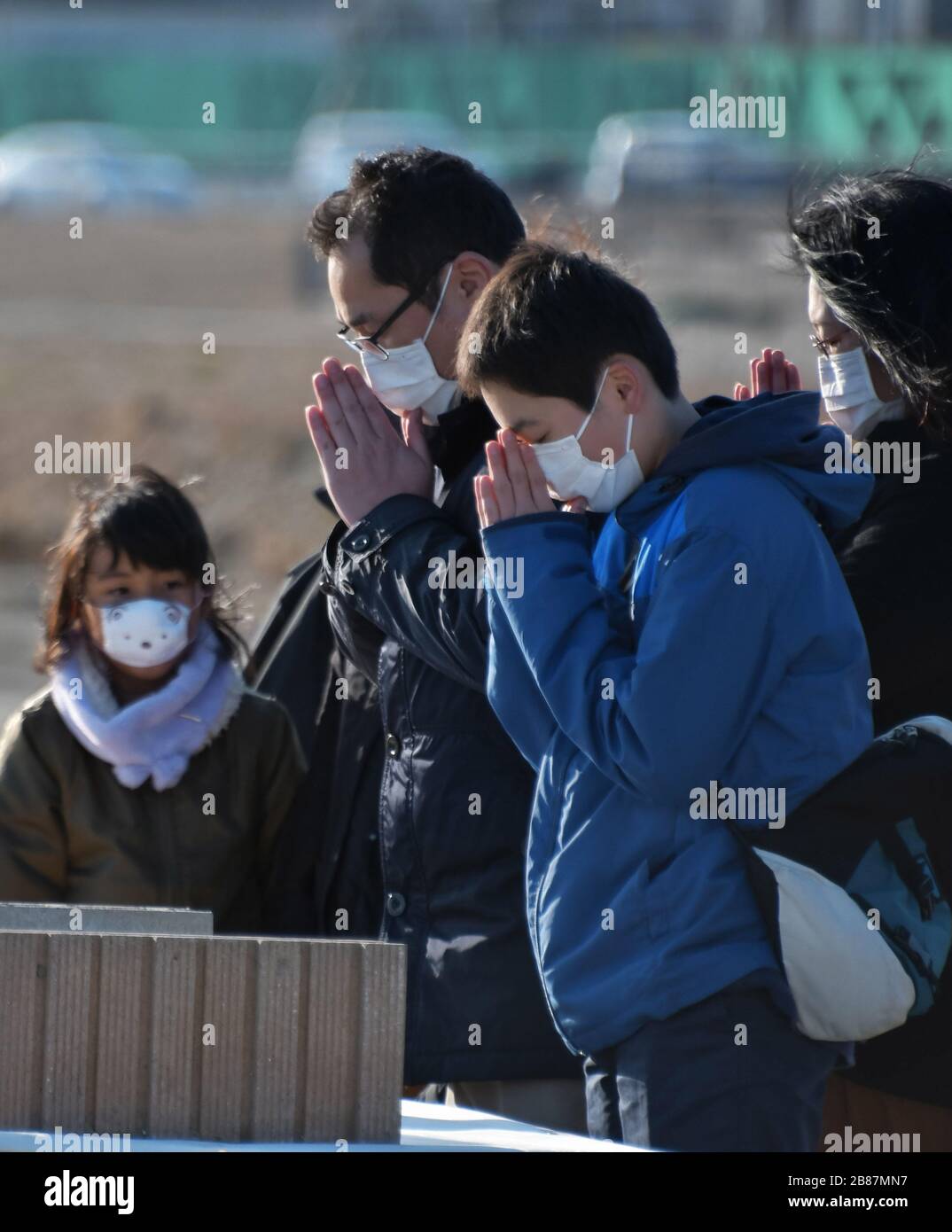 Higashimatsushima, Japan. 20th Mar, 2020. People visitto pray at ...