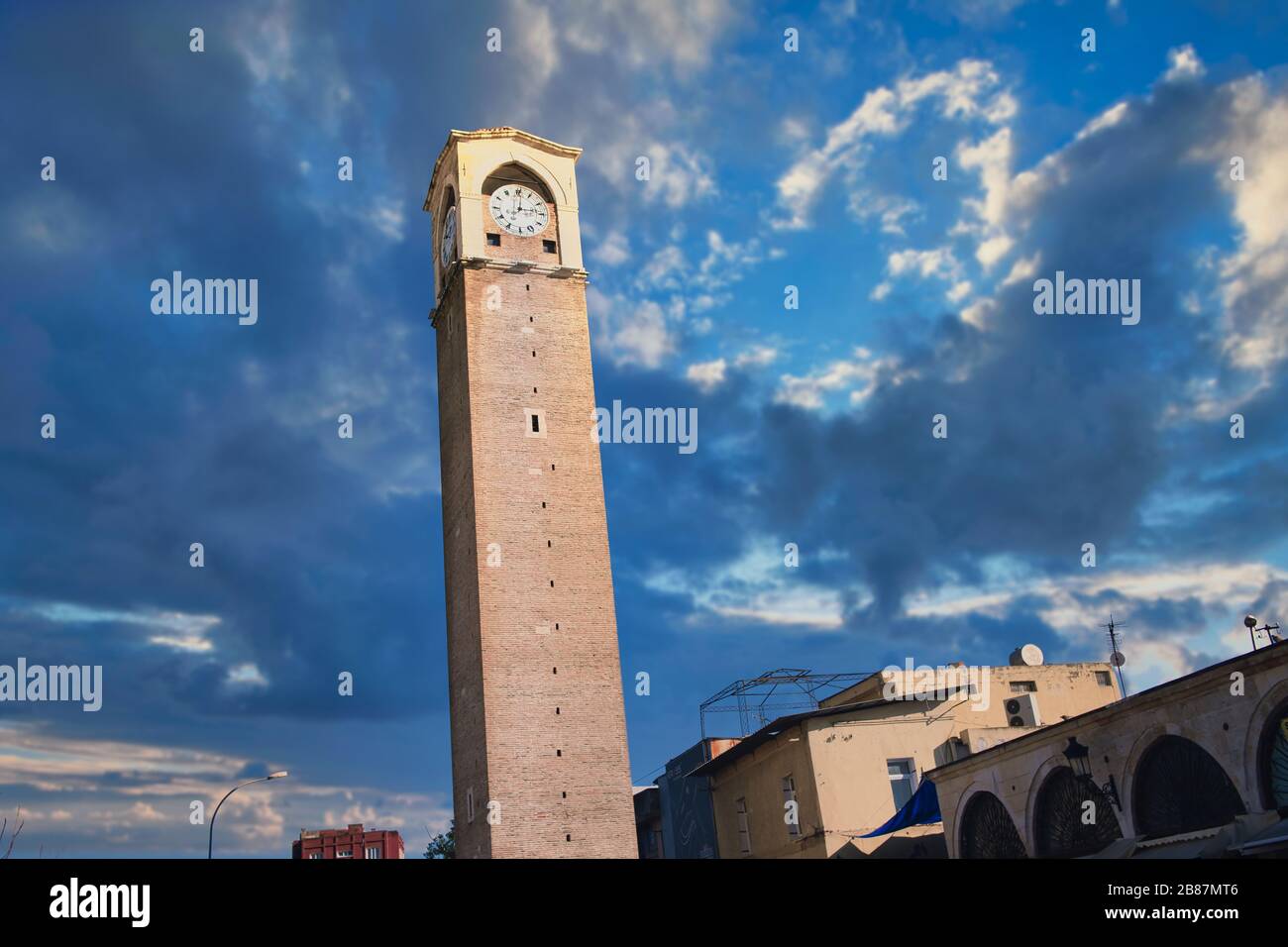 Old clock tower with blue and clouds sky in Adana, Turkey. Historical ...