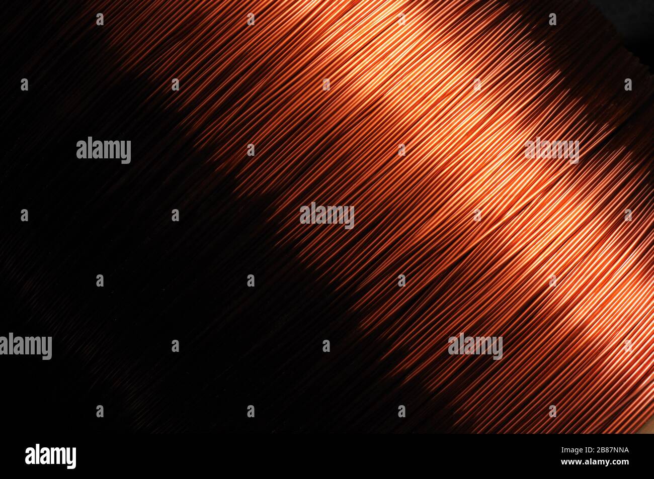 Close-up large coil of thin copper wire in the production of technical ...