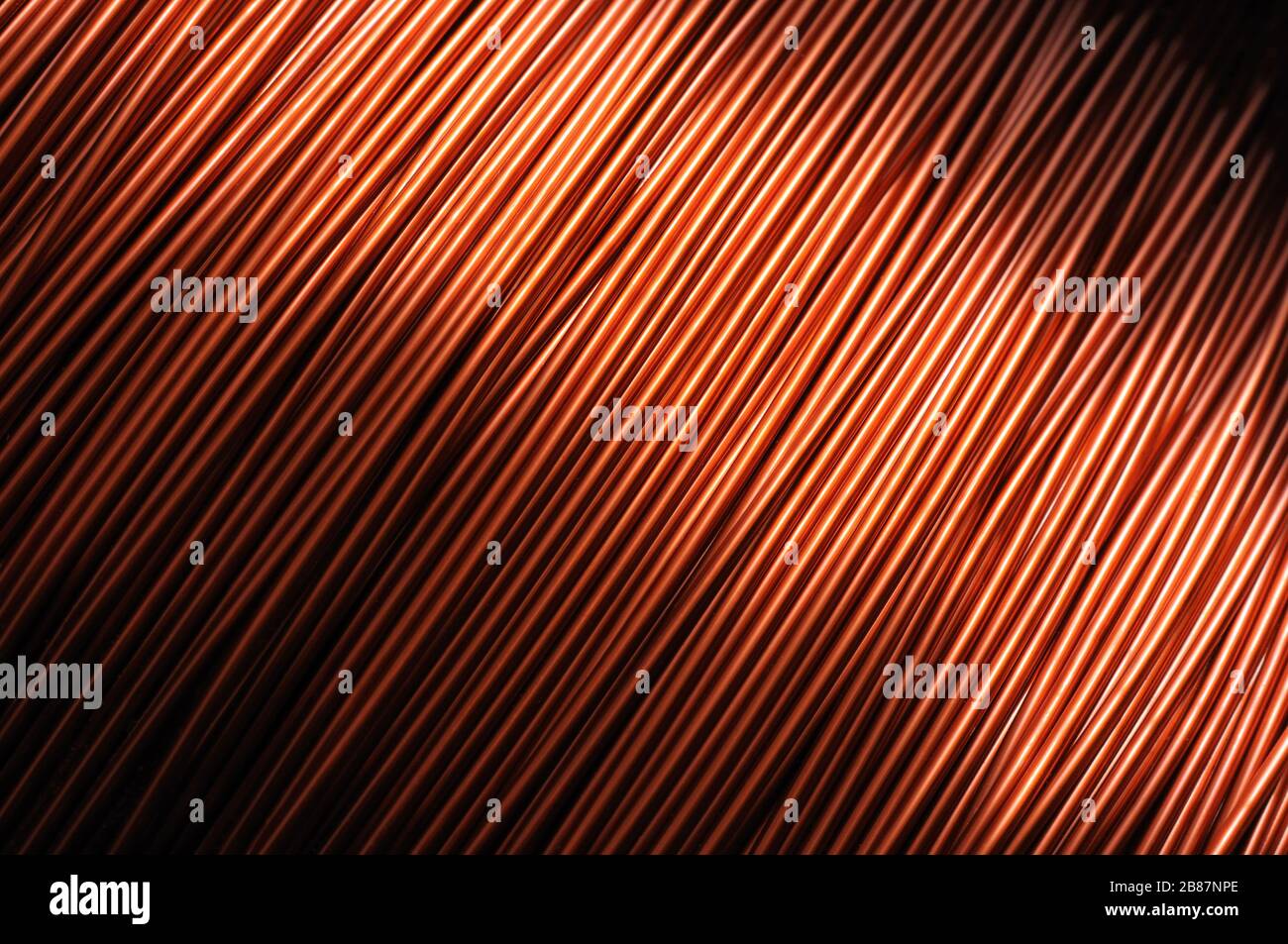 Close-up large coil of thin copper wire in the production of technical ...