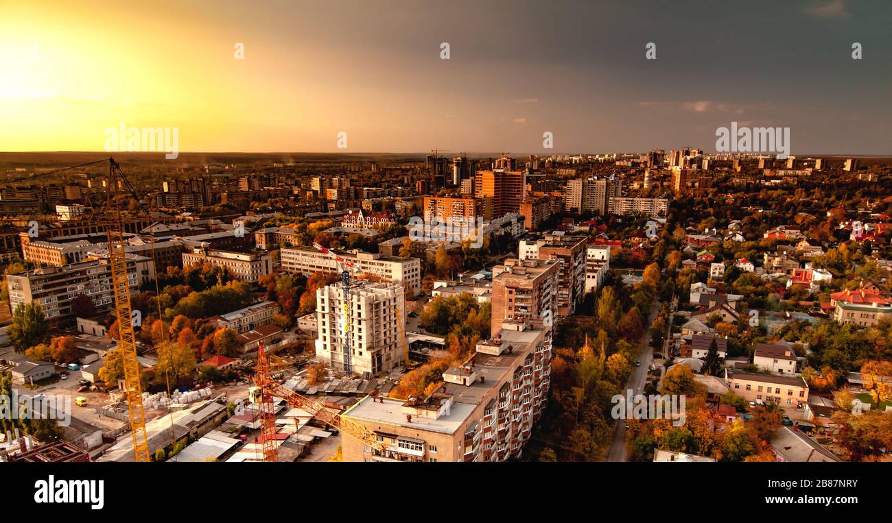 Aerial view of a bewitching panorama of a modern big city on a warm ...