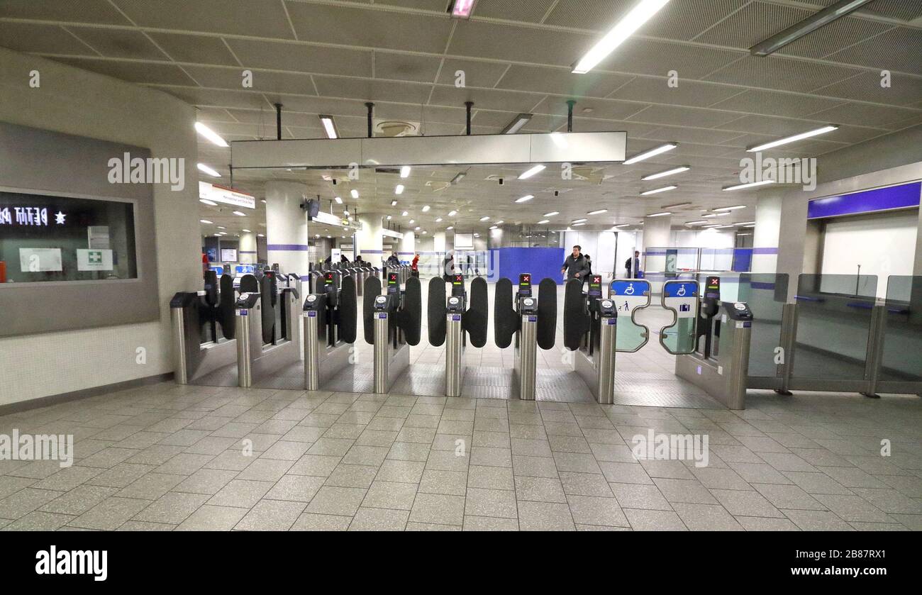 Empty ticket barriers and concourse at London Kings Cross St Pancras ...