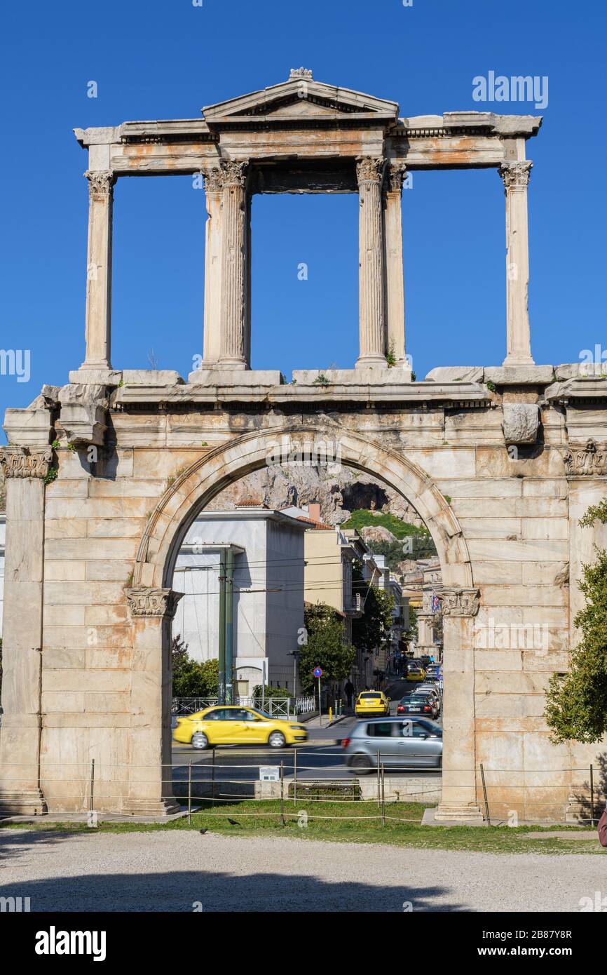 Hadrian's gate with Acropolis hill at the background, Athens, Greece ...