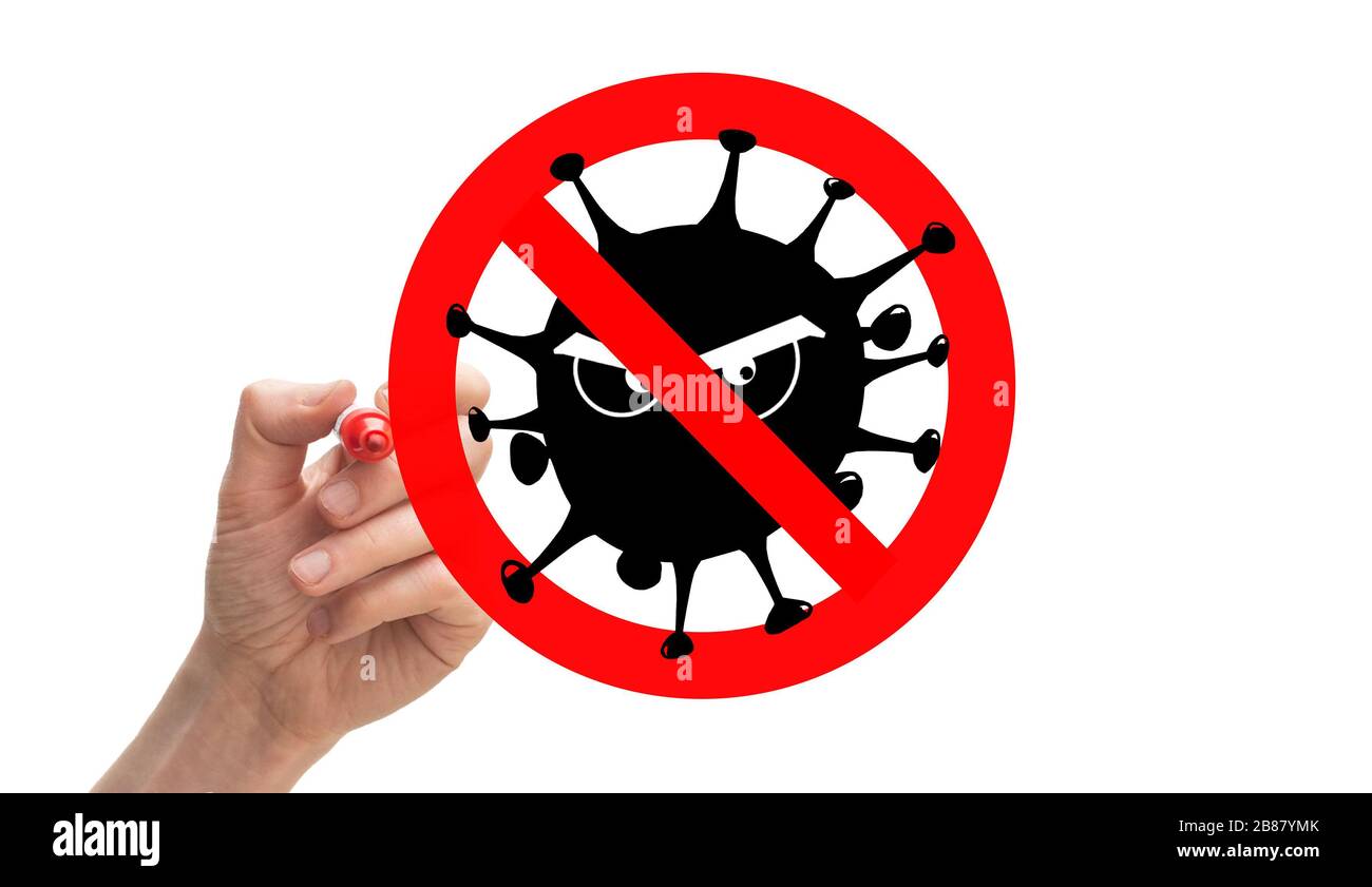 Stop sign around the drawing of a virus withmean eyes Stock Photo - Alamy
