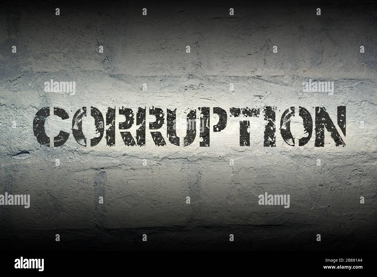 corruption stencil print on the grunge white brick wall Stock Photo - Alamy