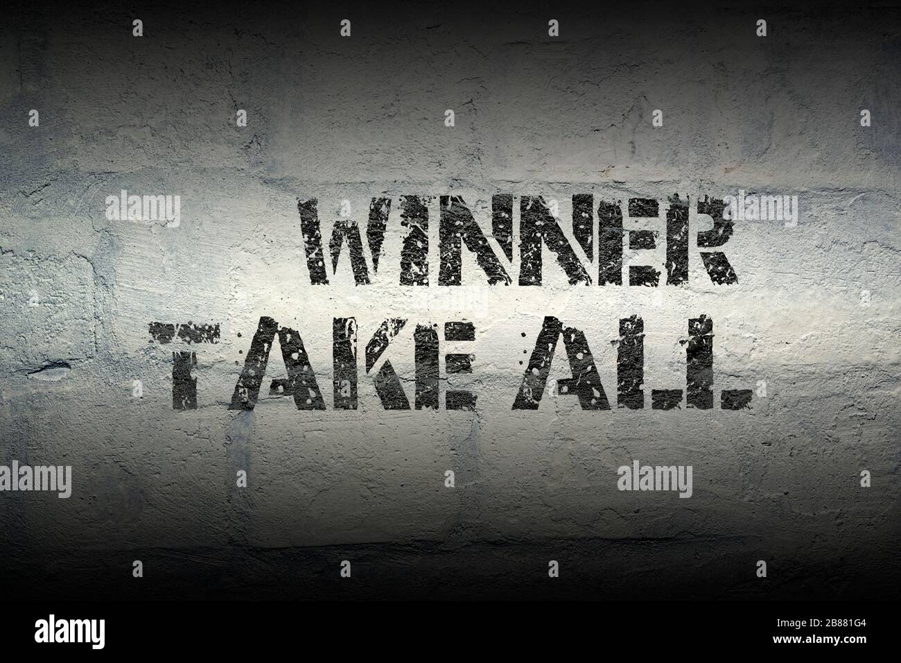 winner take all stencil print on the grunge white brick wall Stock ...