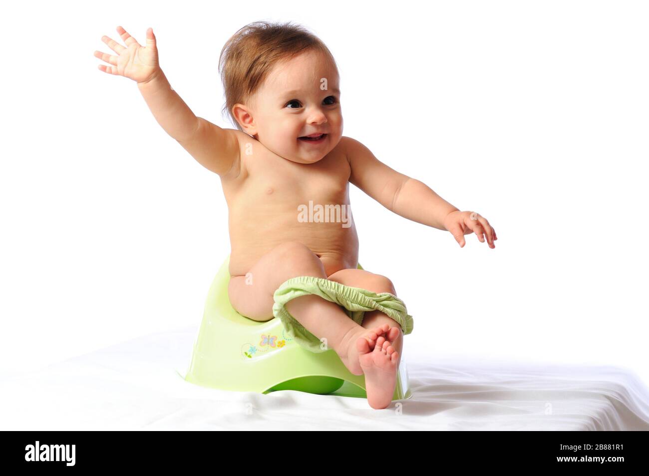 Potty training of adorable funny baby portrait on isolated white ...