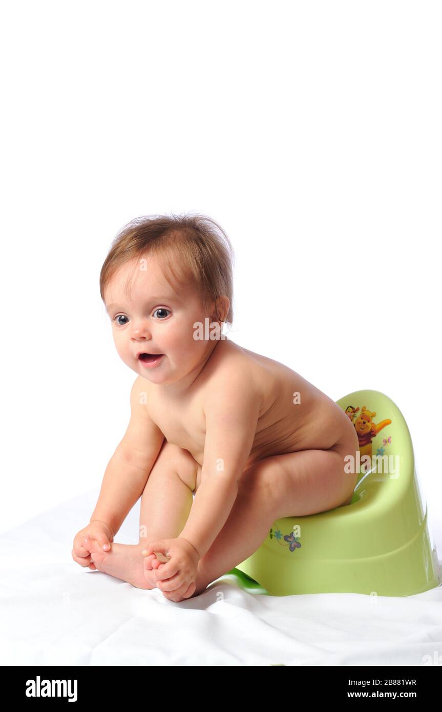Potty training of adorable funny baby portrait on isolated white ...