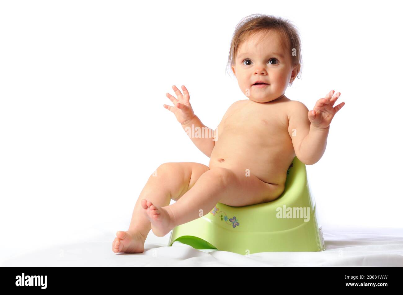 Potty training of adorable funny baby portrait on isolated white ...