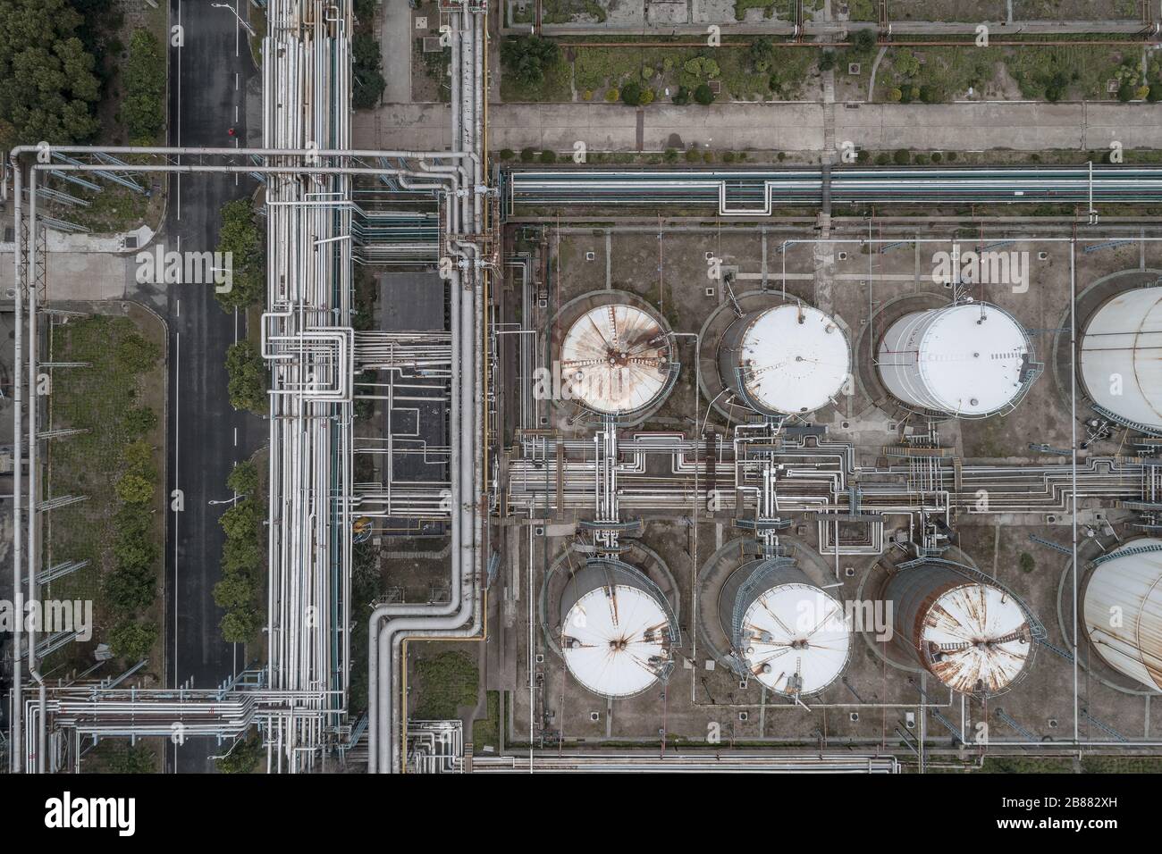 Aerial view of the pipelines and storage tanks Stock Photo - Alamy