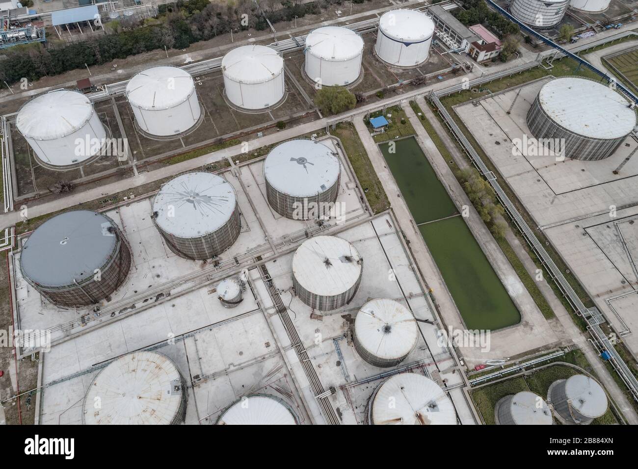 Aerial view of the pipelines and storage tanks Stock Photo - Alamy