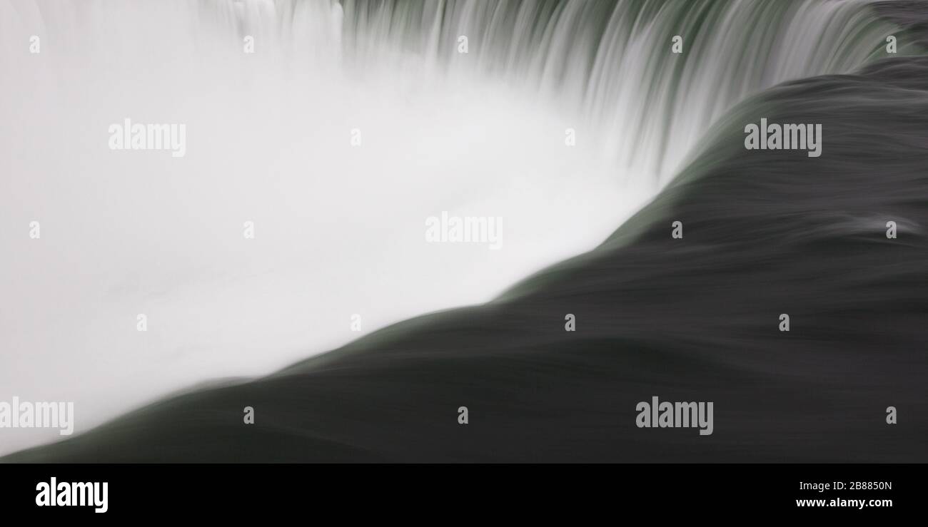 A Long exposure picture of the water flowing over the edge at the ...