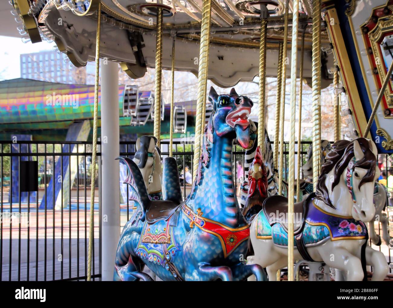 A blue sea dragon is one of the many animal characters on the carousel ...