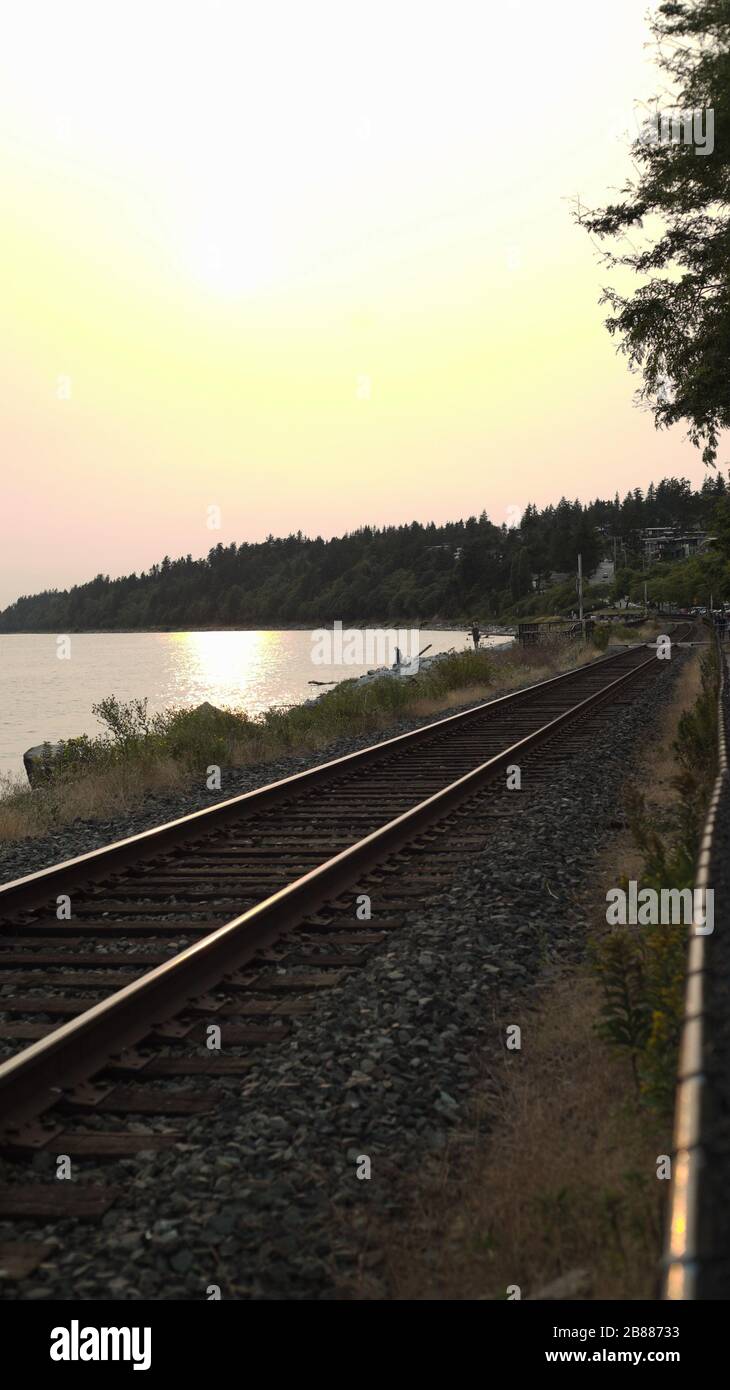 Horizon line of a sunset near a train track in White Rock BC Stock ...