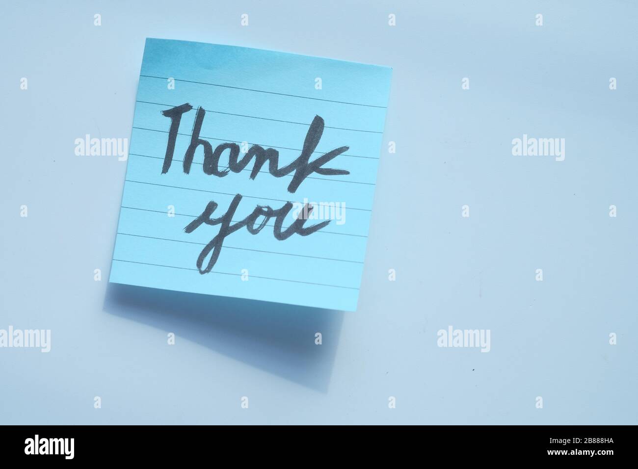 top view of thank you message on white background Stock Photo - Alamy
