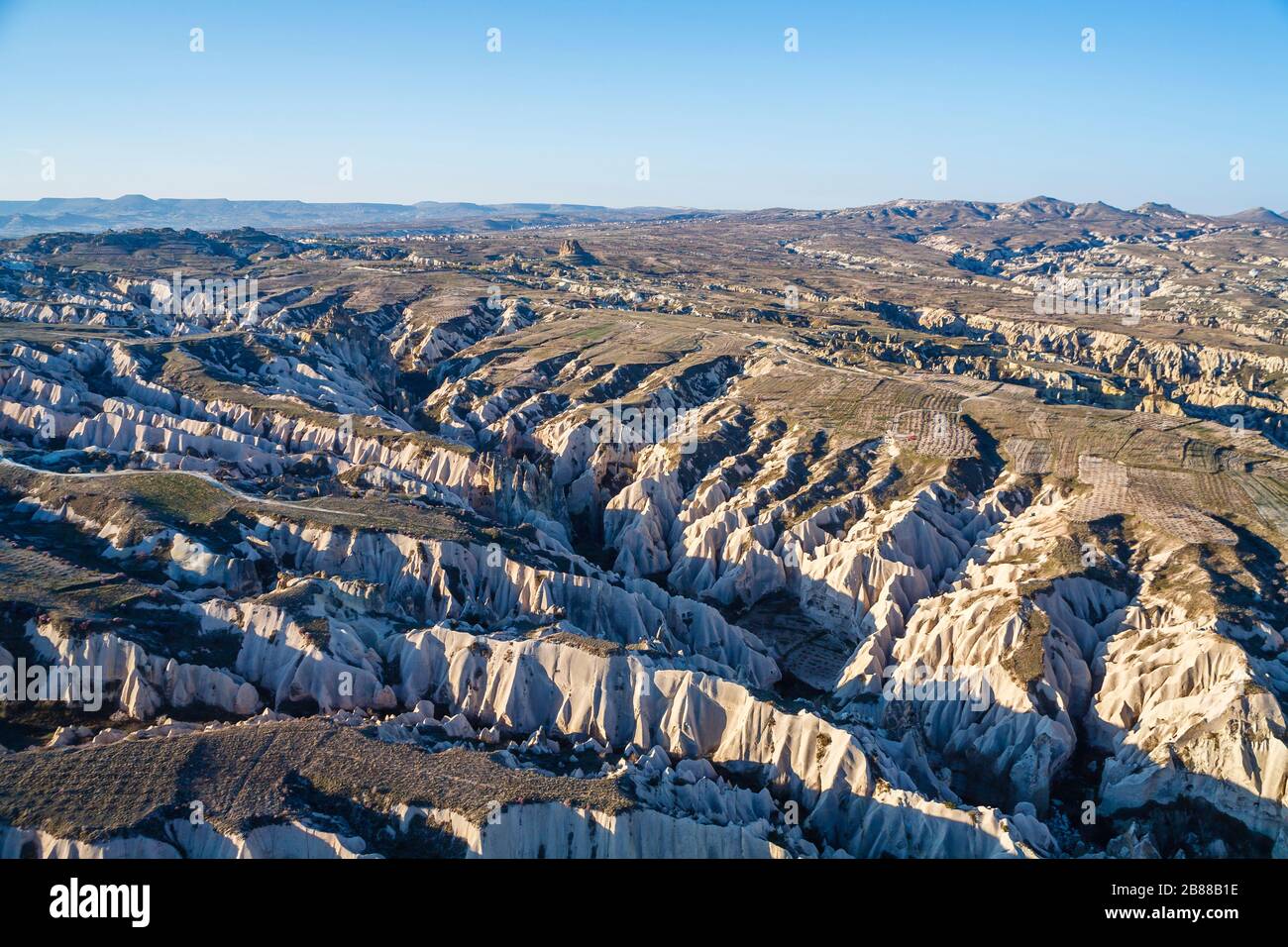 Panoramic early morning aerial view over the dramatic, arid, eroded ...