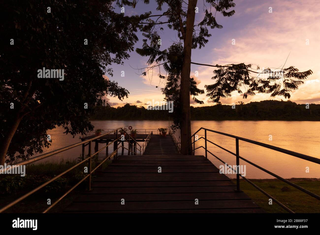 Shimmering Sunset River Deck View In The Amazon Stock Photo - Alamy