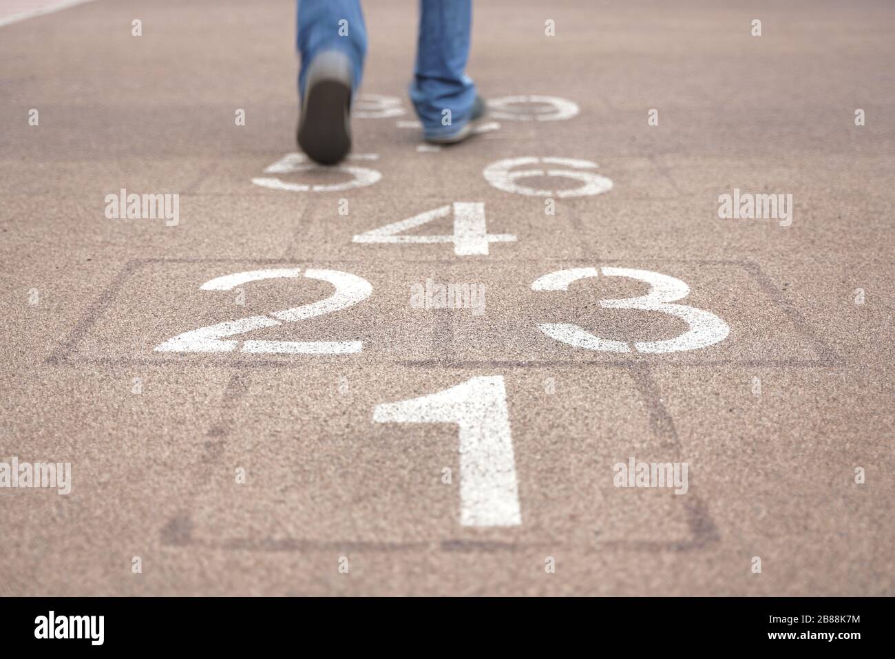 kid playing hopscotch on playground outdoors, children outdoor ...