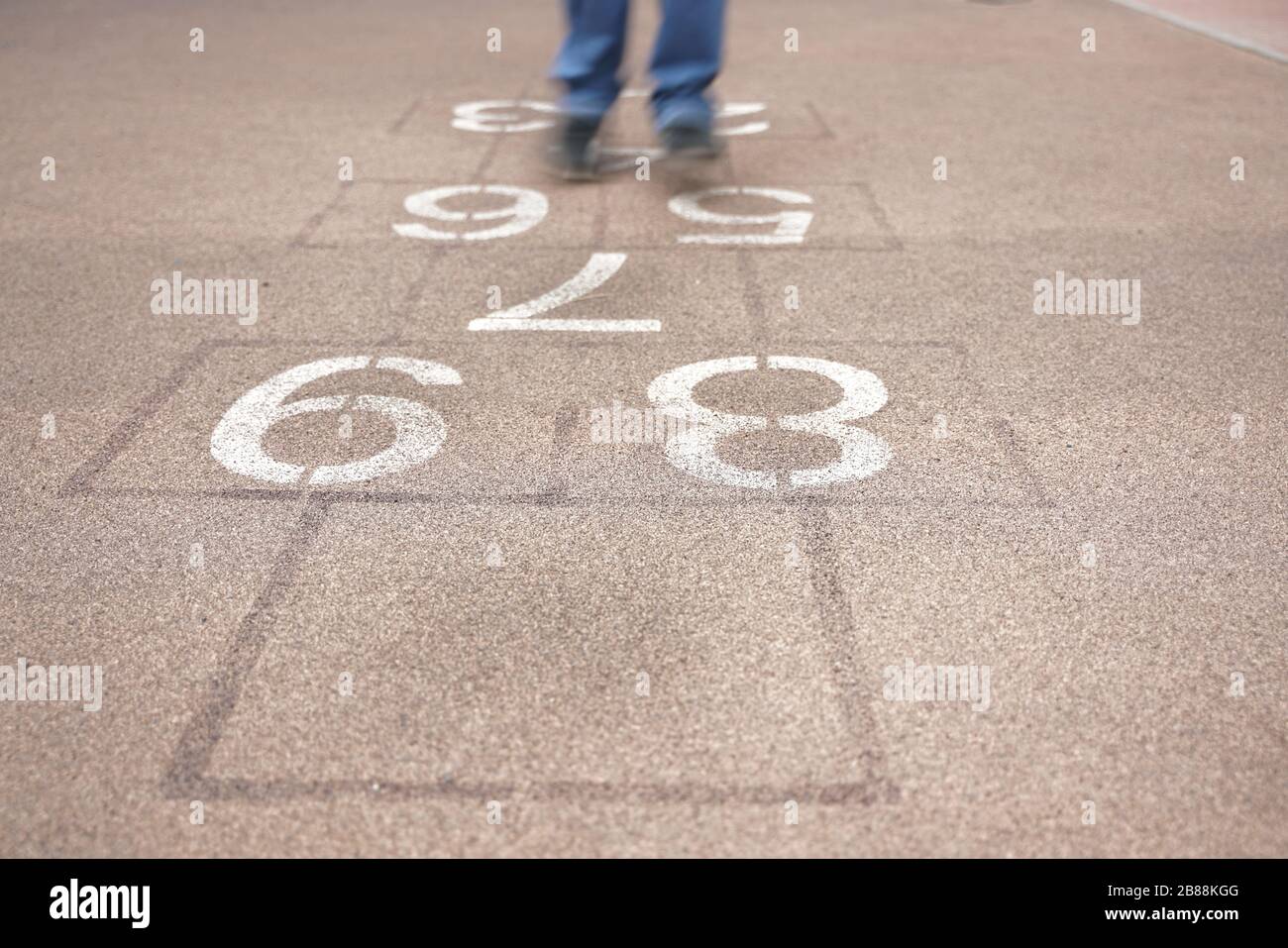 kid playing hopscotch on playground outdoors, children outdoor ...