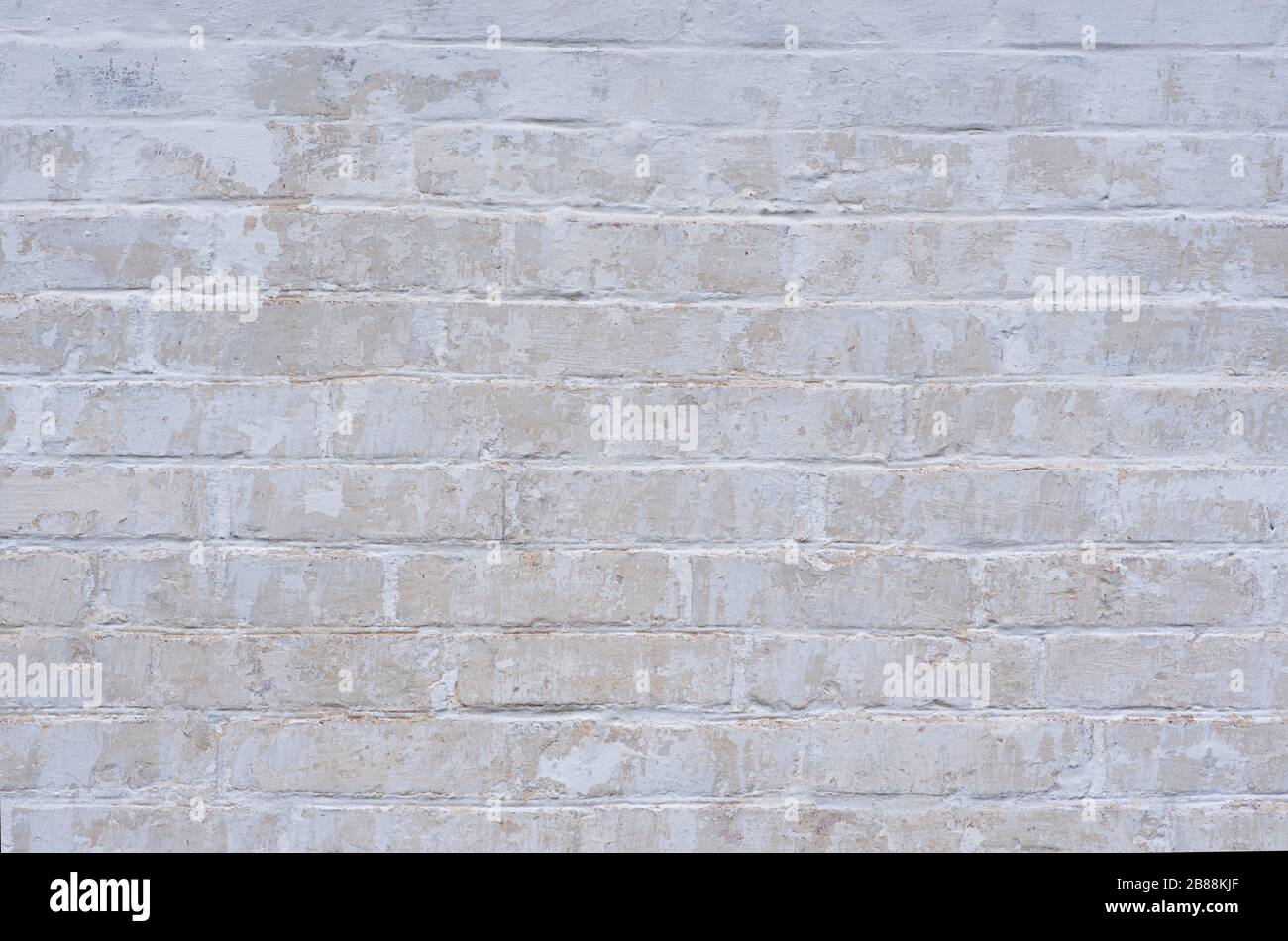 White weathered wall, peeling wall, made of silicate brick. Texture ...
