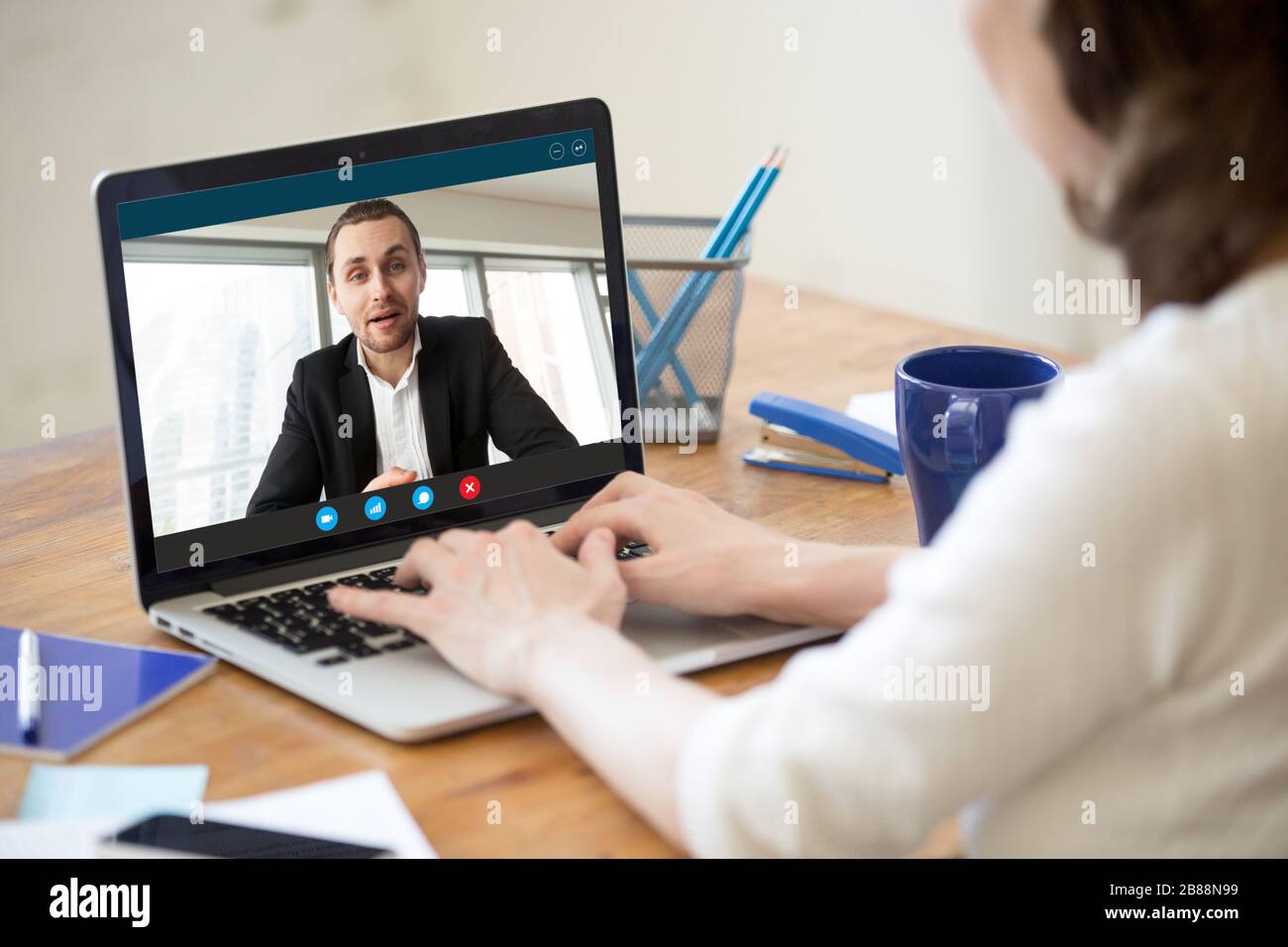 View over shoulder businesswoman listen applicant at distant job ...