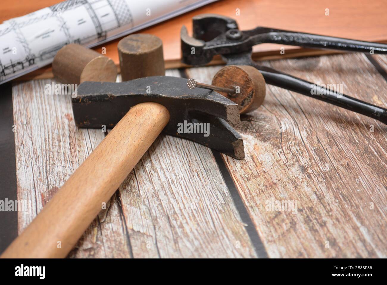 carpenter work tools hammer nail pincer wood Stock Photo - Alamy