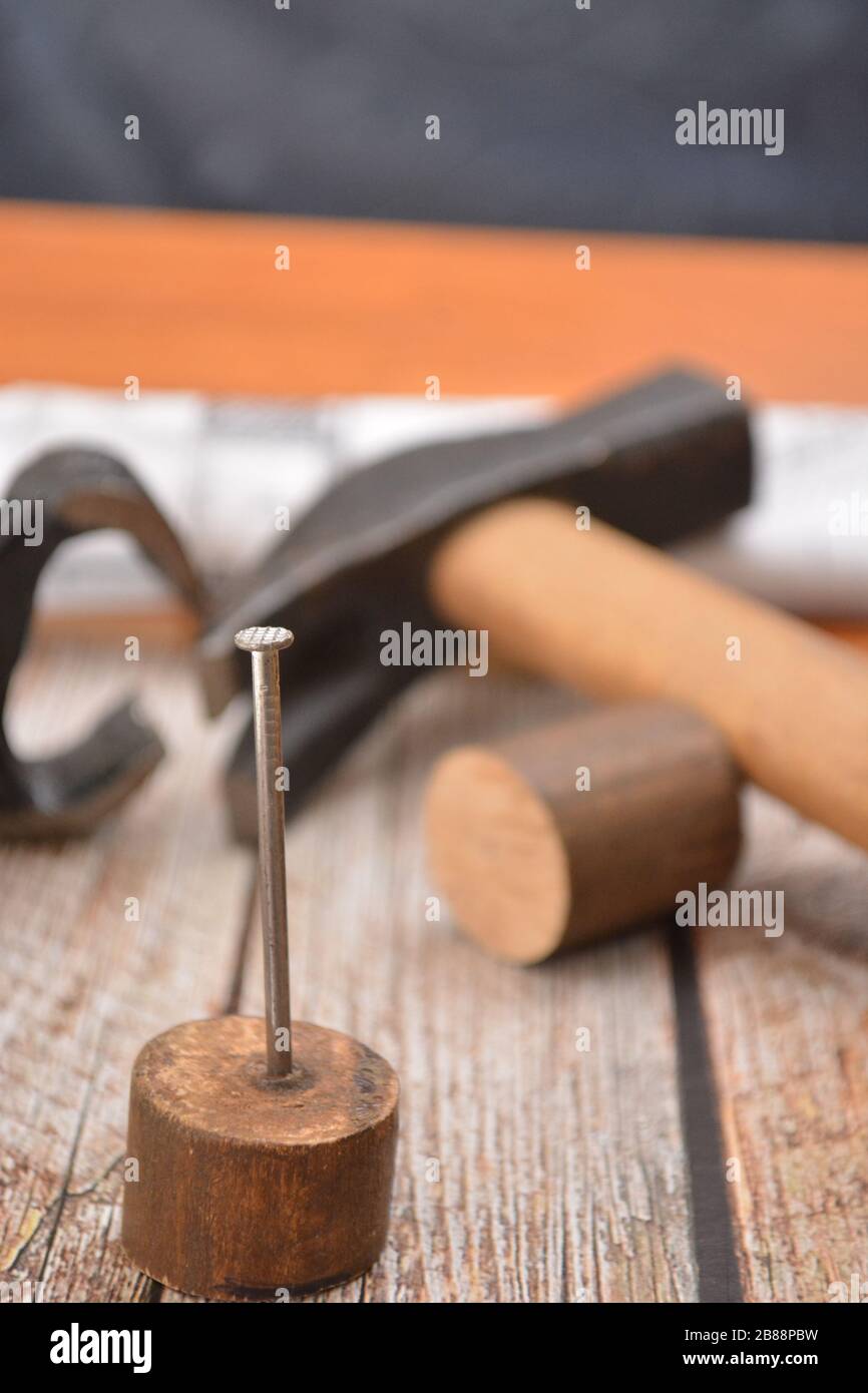 carpenter work tools hammer nail pincer wood Stock Photo - Alamy