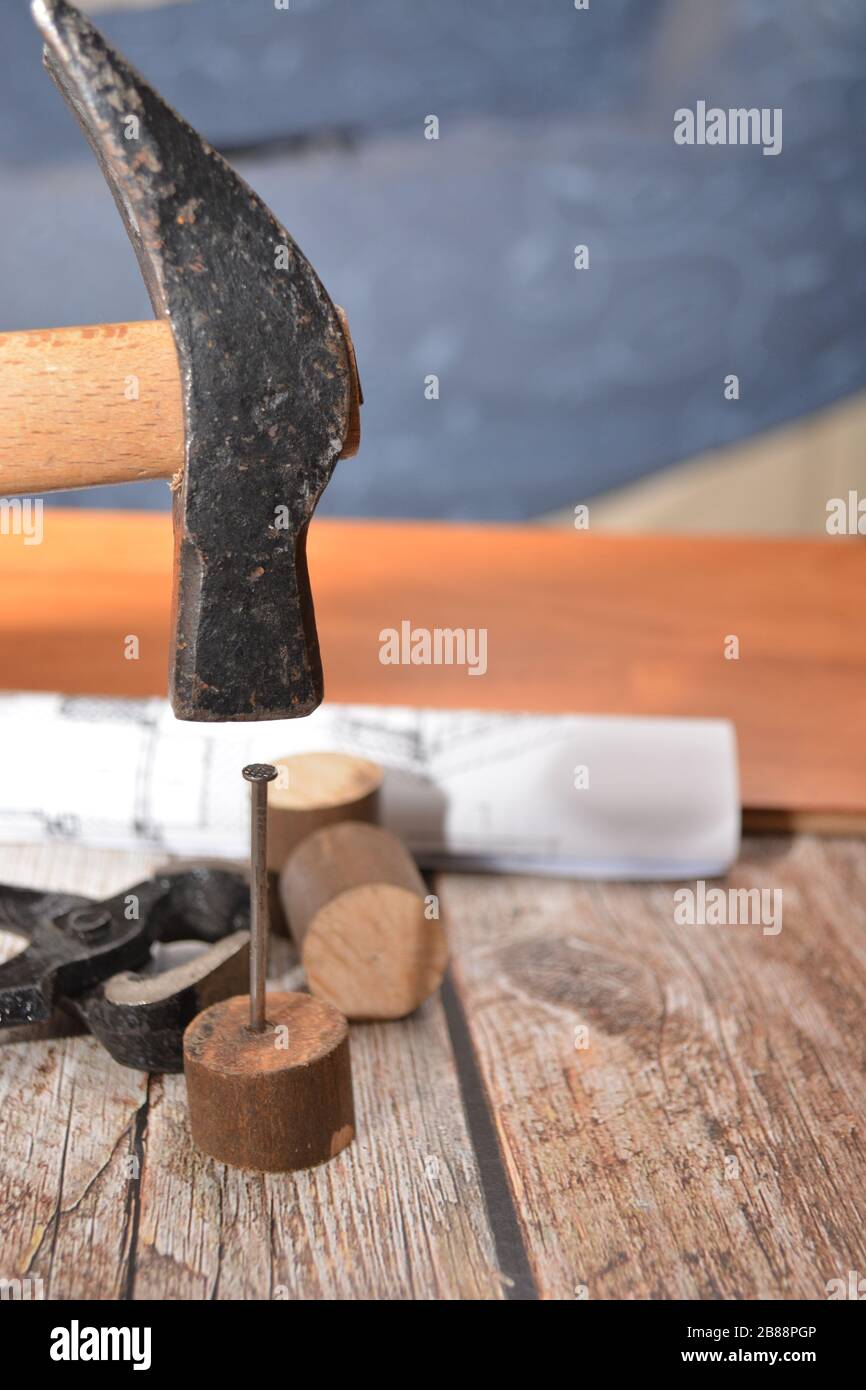 carpenter work tools hammer nail pincer wood Stock Photo - Alamy