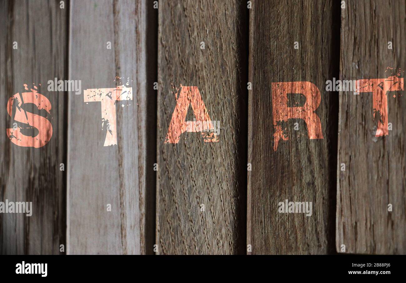 Start word on wooden fence background. Business startup concept Stock ...