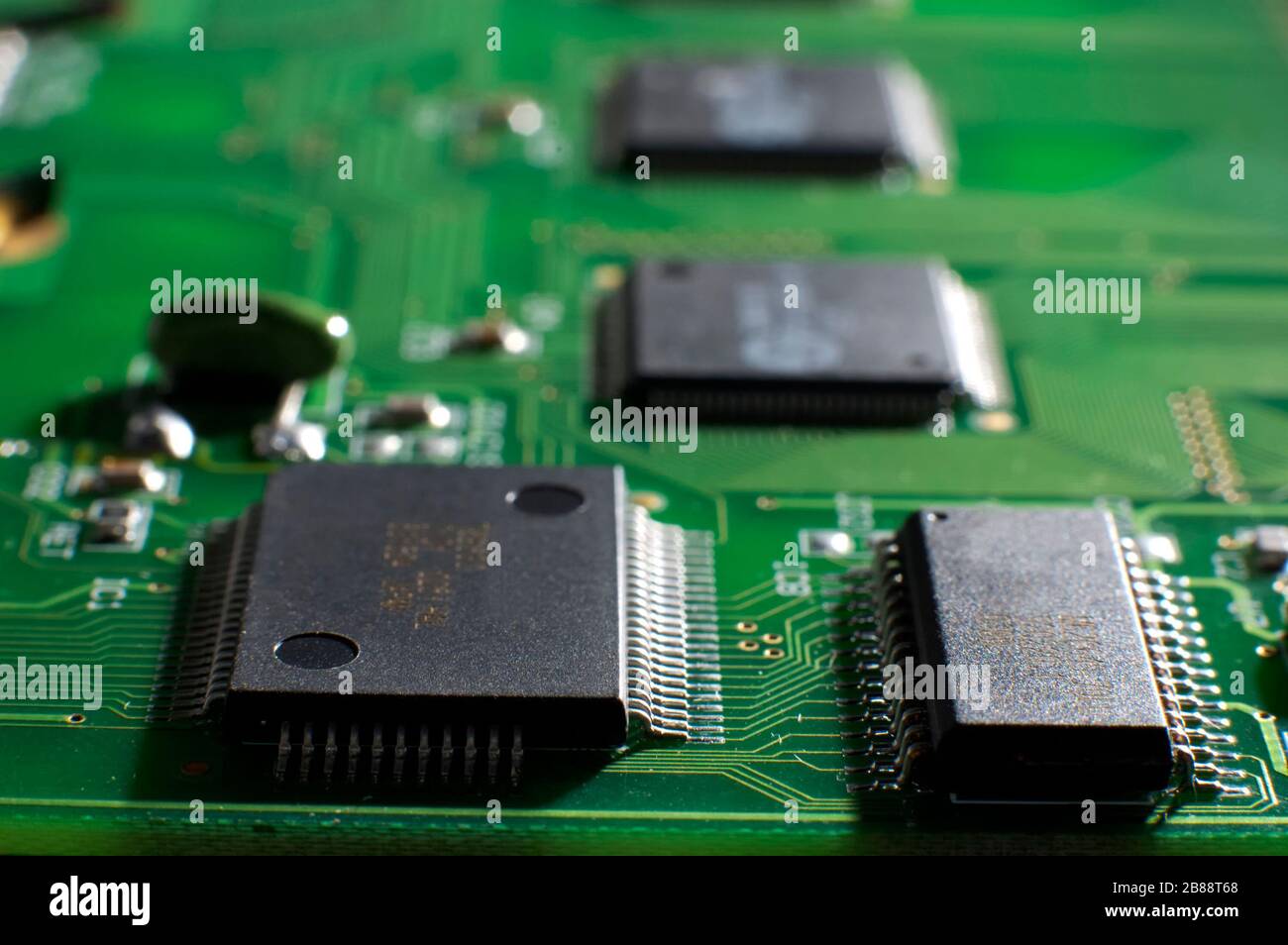 Close up shot memory board with SMD chip lies on the table. Computer ...