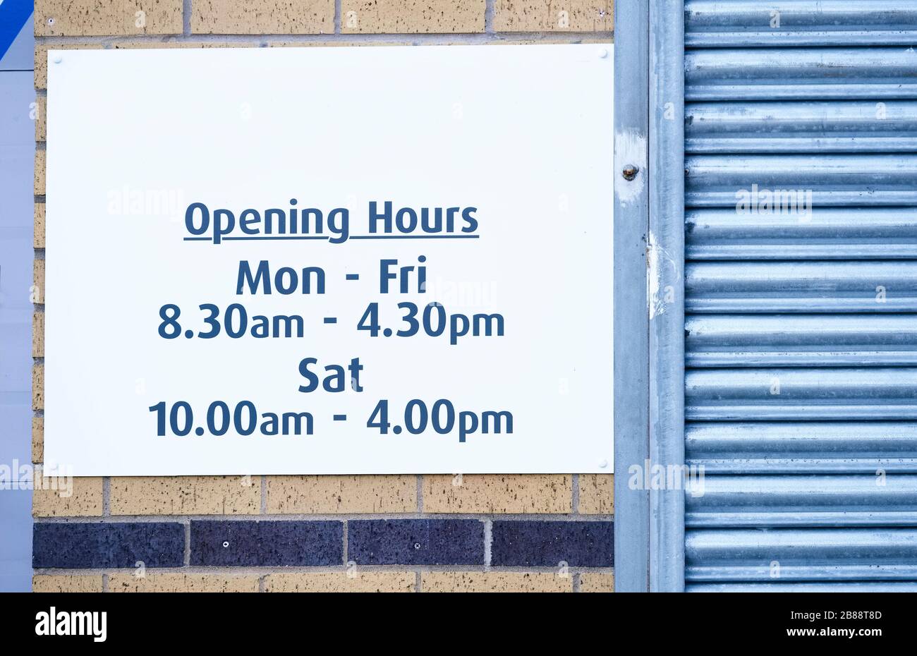 Opening hours of business sign Monday to Friday and Saturday Stock ...