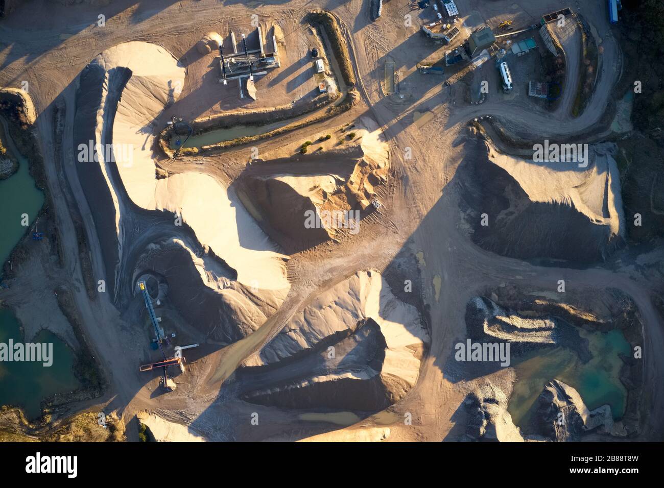Quarry works industrial digging aerial view from above showing sand ...