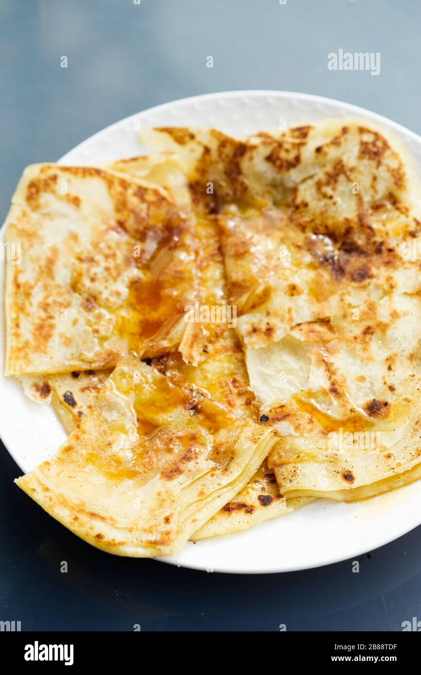 Sweet msemen - Moroccan pancakes with honey Stock Photo - Alamy