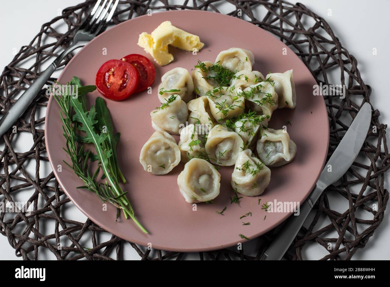 meat dumplings, homemade traditional Ukrainian dish pelmeni Stock Photo ...