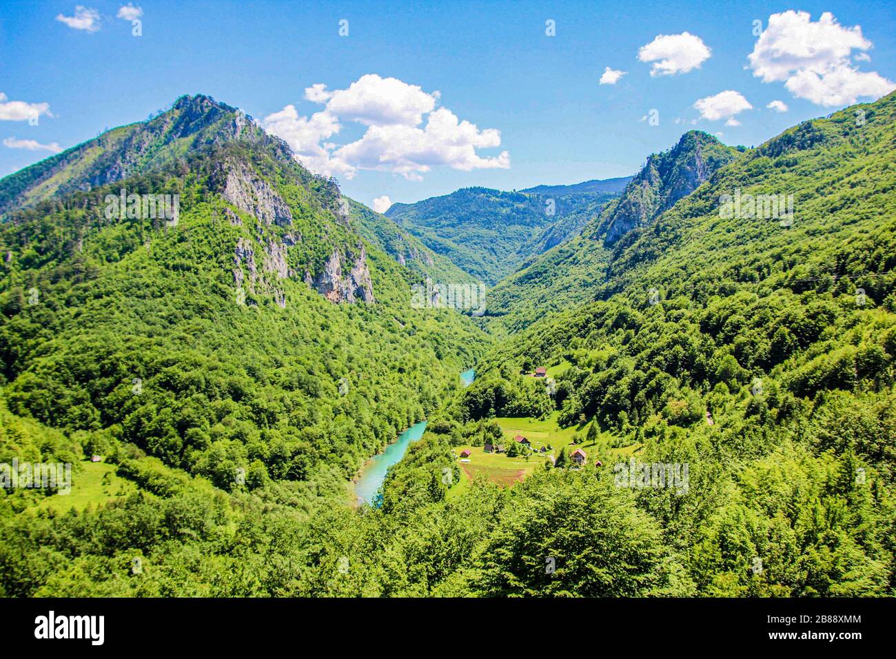 Green mountain landscape with river in the valley Stock Photo - Alamy
