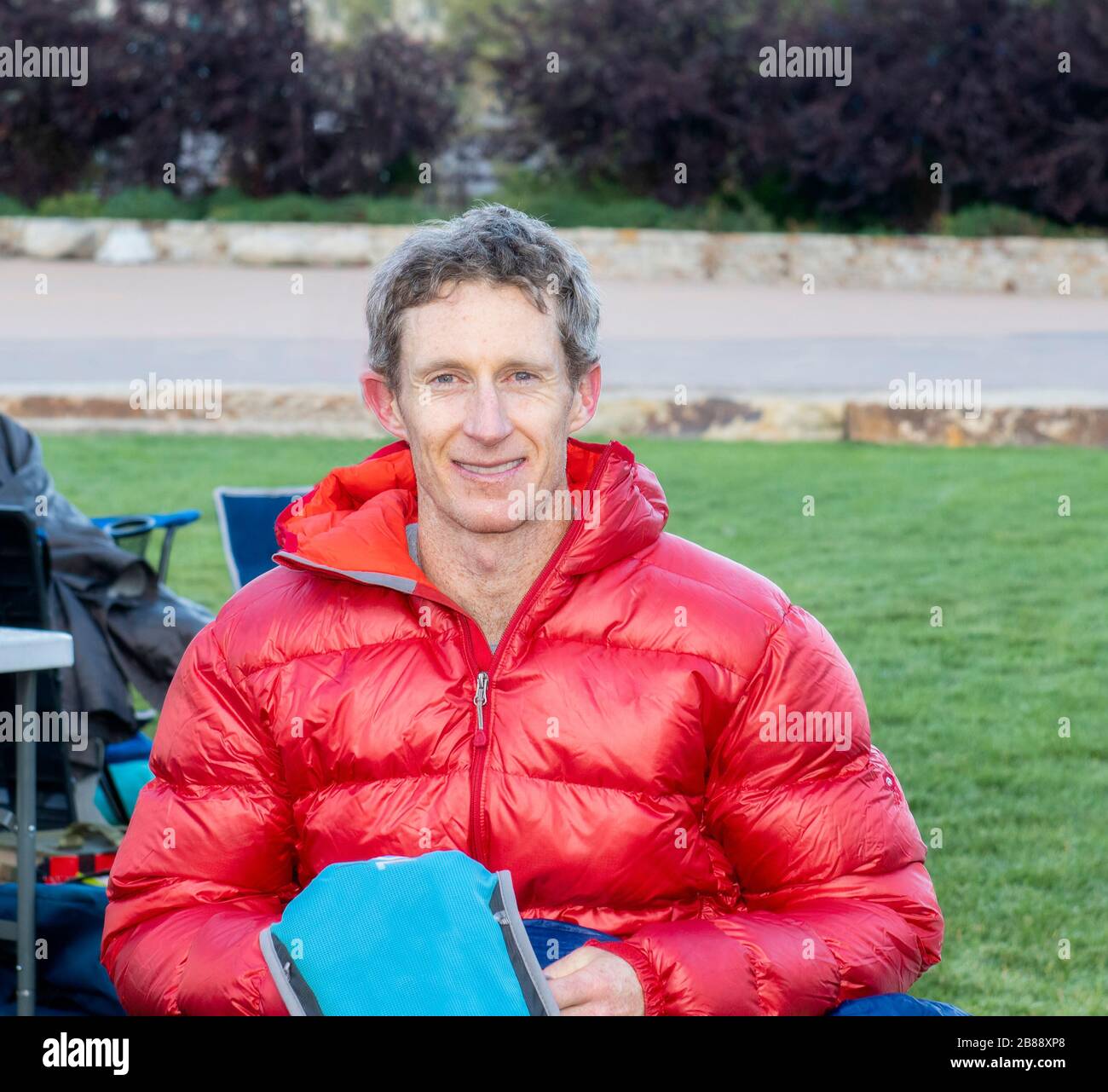 Adult Male Resting Outside in a Down Coat in Steamboat Springs ...