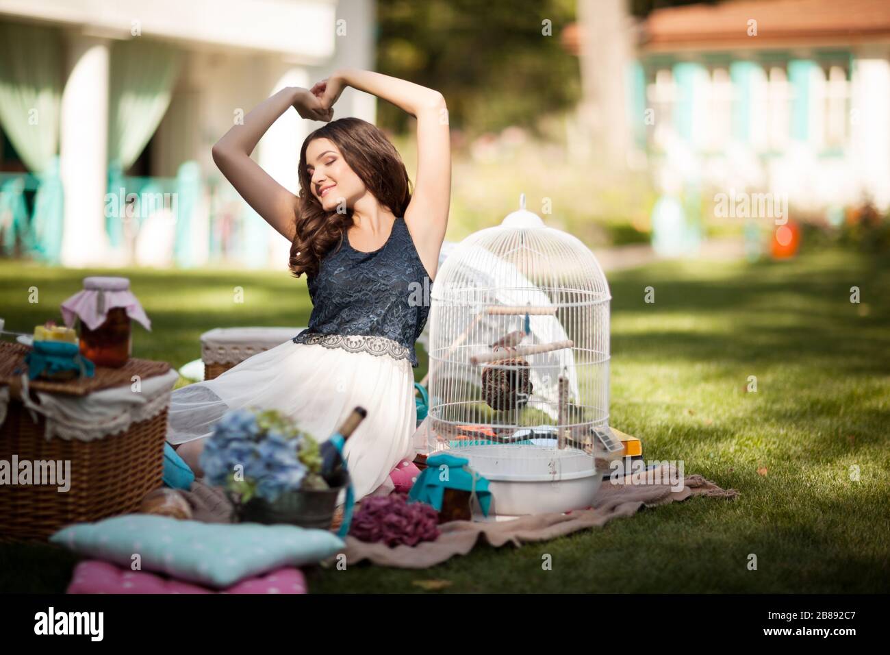 Woman raising hands above head hi-res stock photography and images - Alamy