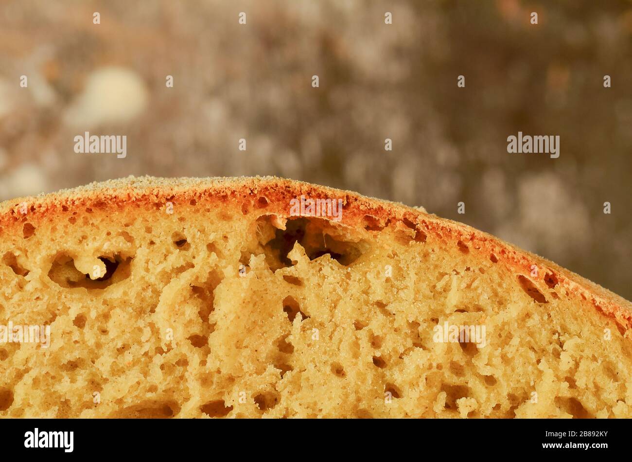 Freshly baked traditional bread on wooden table. Retro bread on the ...